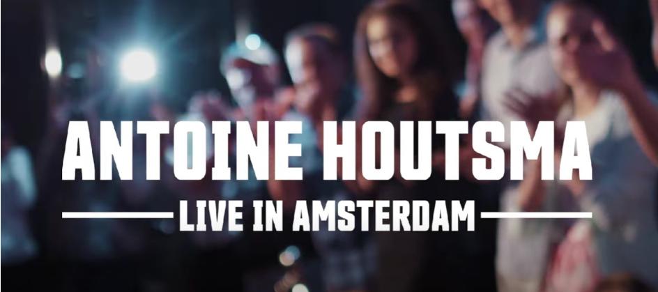 Antoine Houtsma on stage in Comedy Cafe - Marketing Report
